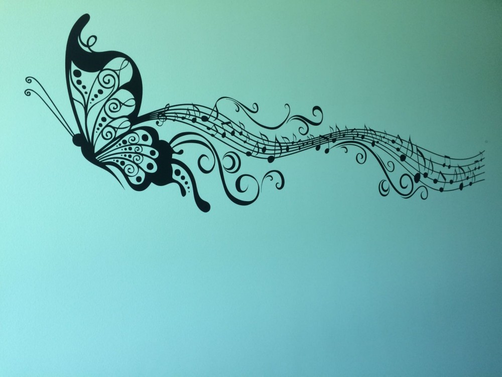 Vinilo decorativo mariposa musical - TenVinilo