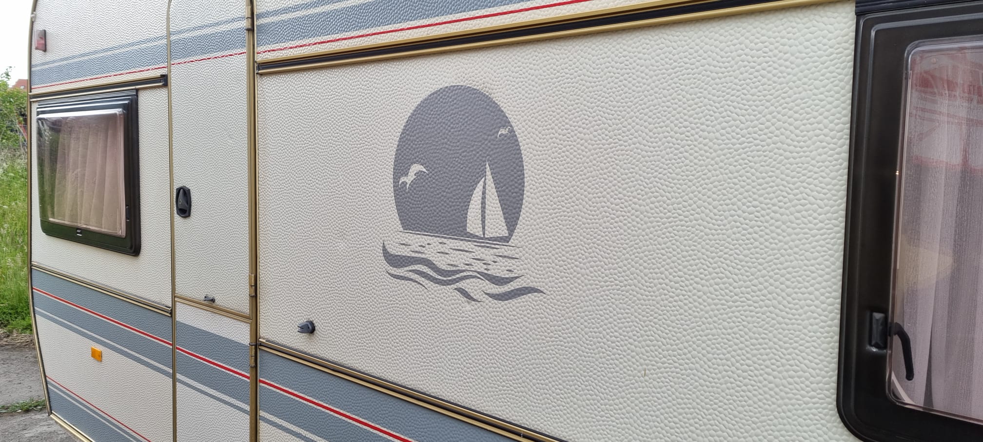 Sunset on beach campervan sticker - TenStickers