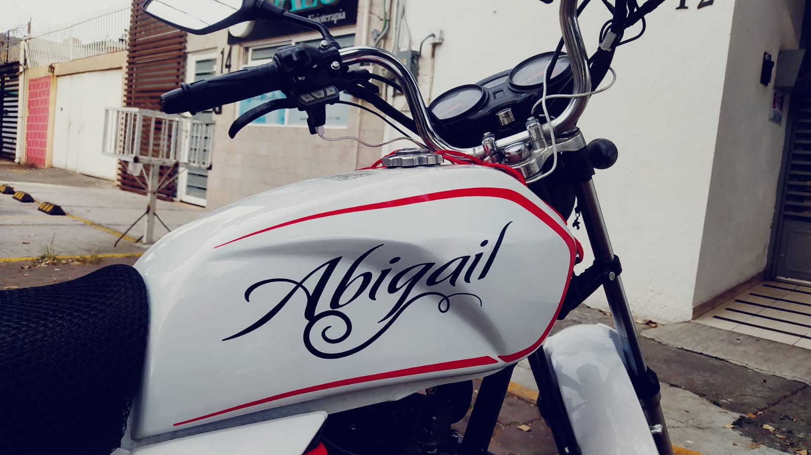 calligraphic filigree name motorcycle decal - TenStickers