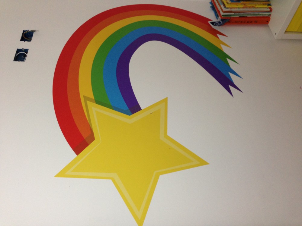 Regenboog ster sticker - TenStickers